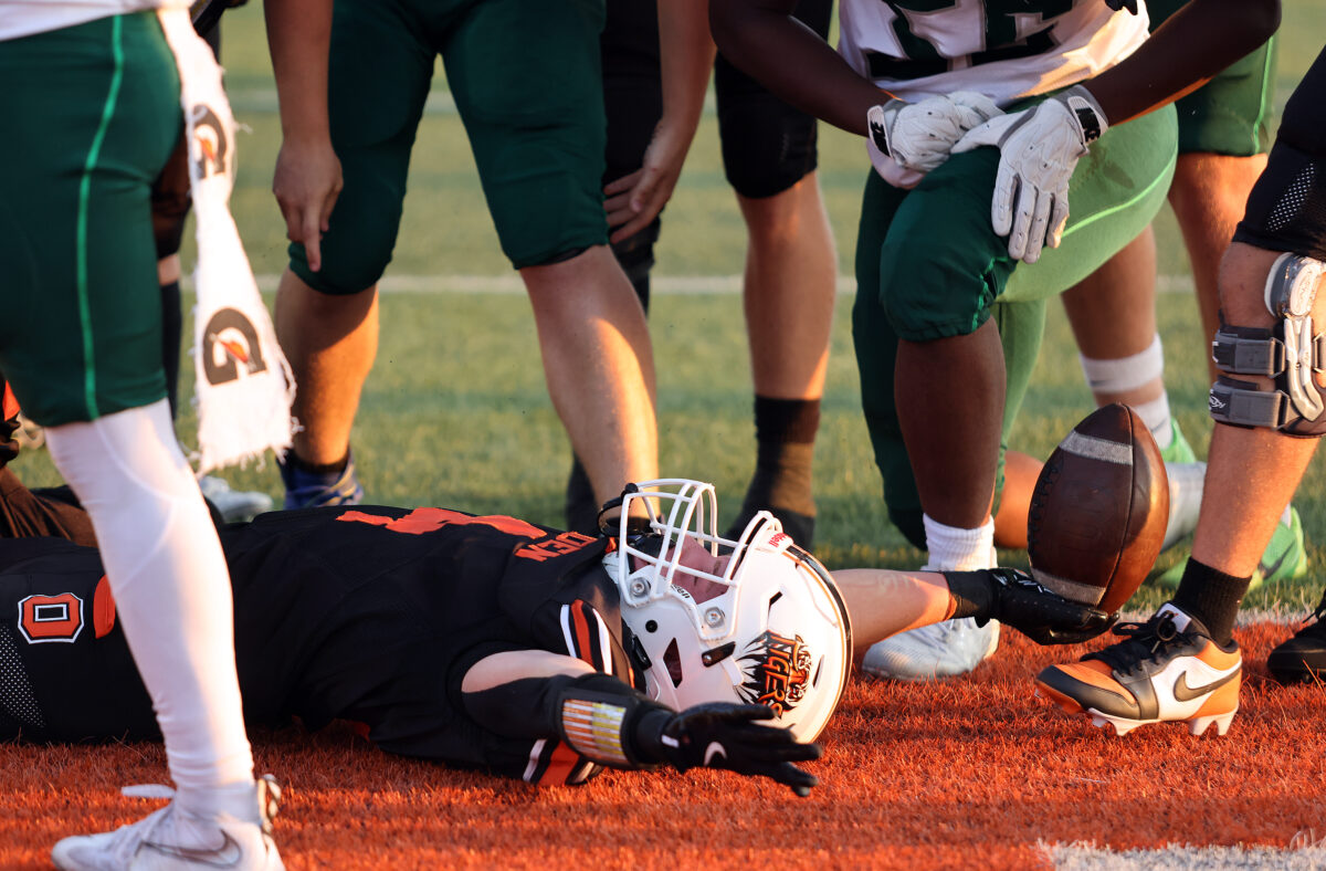 Prep football: Ogden sticks with effort, pulls away to defeat ...